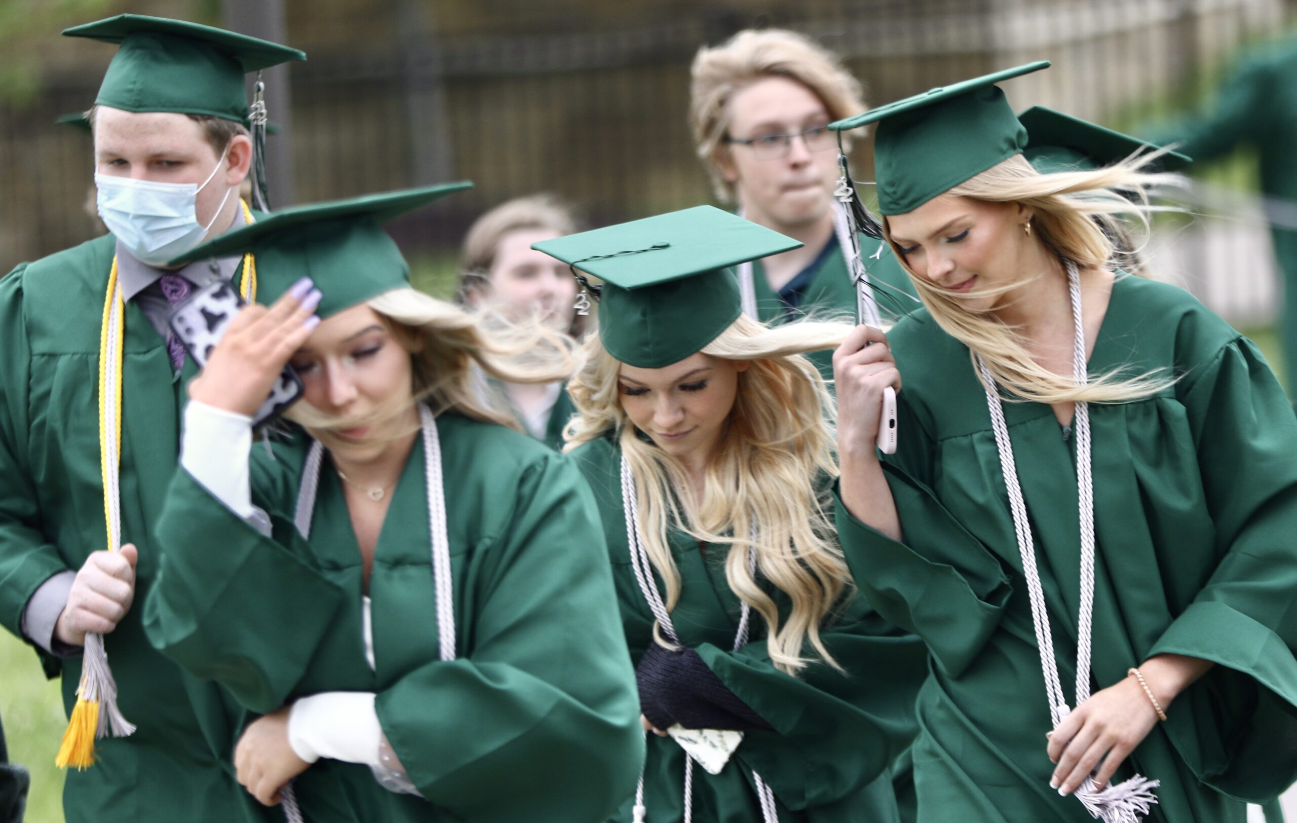 Bad weather created scheduling woes for local graduations, but using ...
